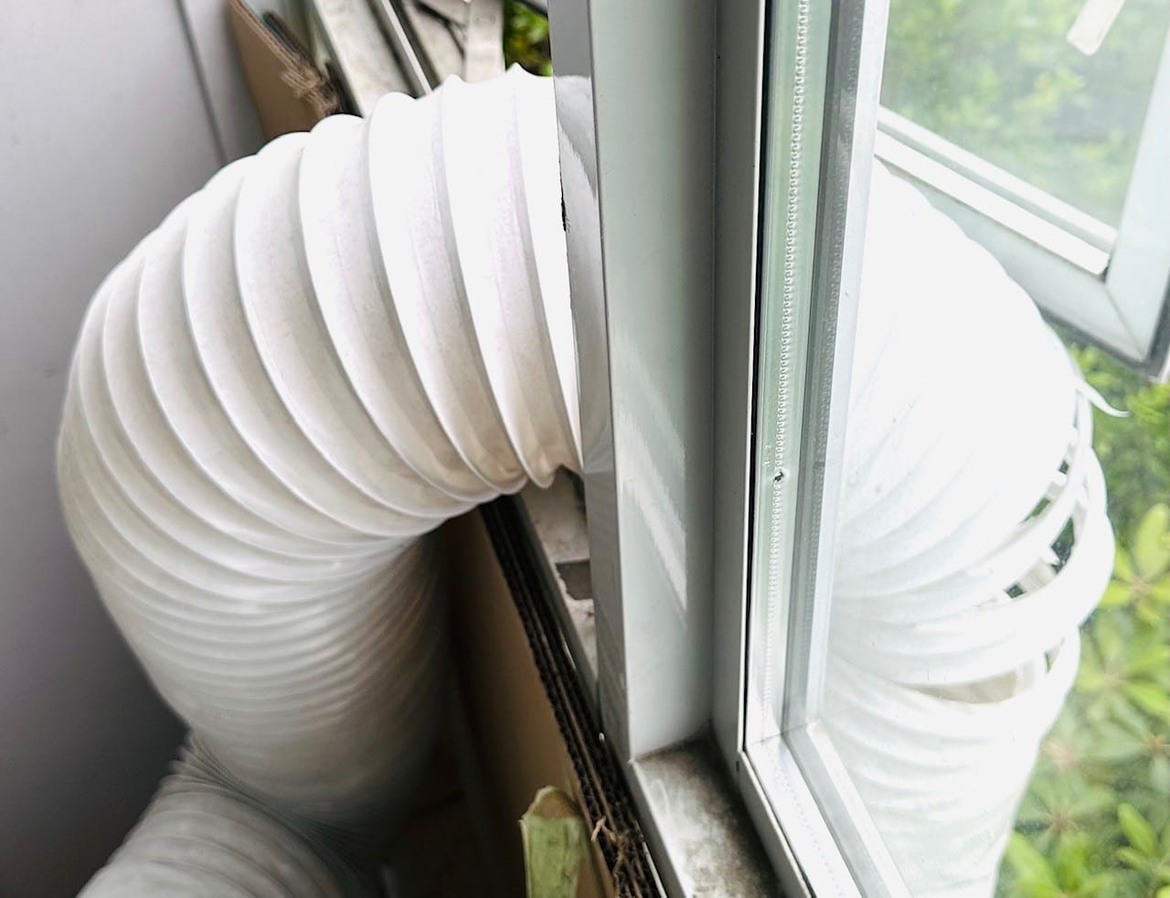 Why Hanging Your AC Hose Out the Window Doesn’t Work - Aircon Rescue Inc.
